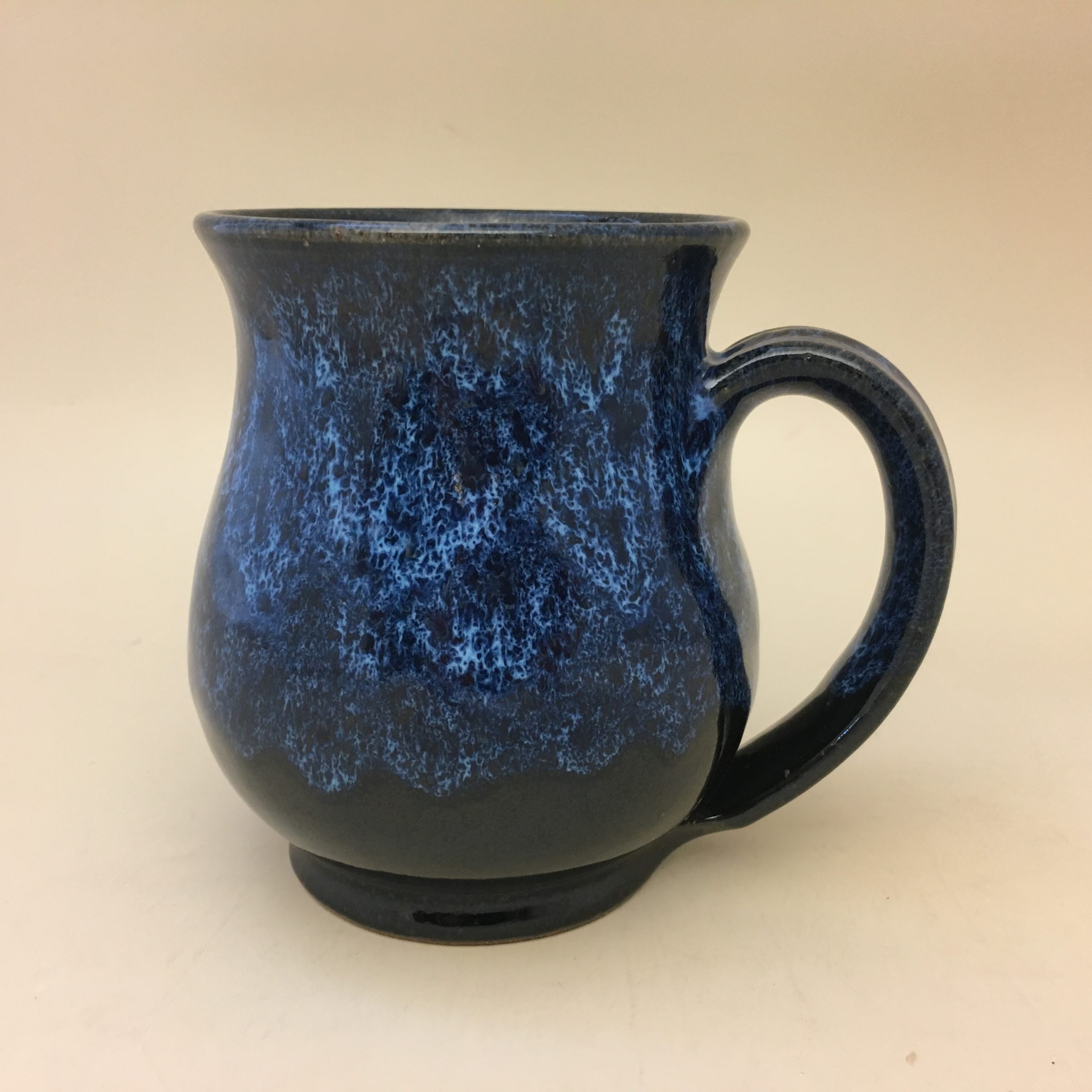 417 Mug – Blue on Black (round) – Wizard of Clay Pottery
